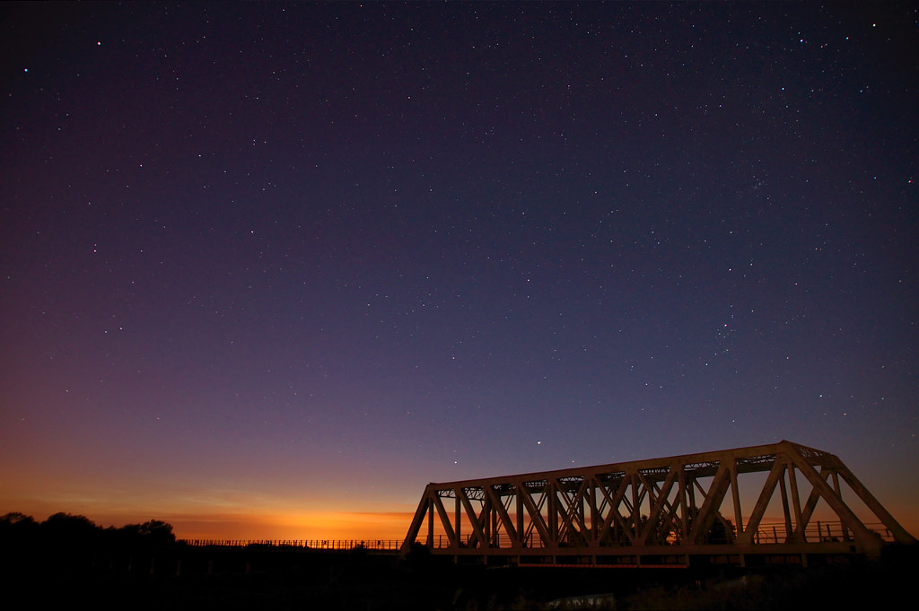 Rail bridge, starry night by James Billings / 500px