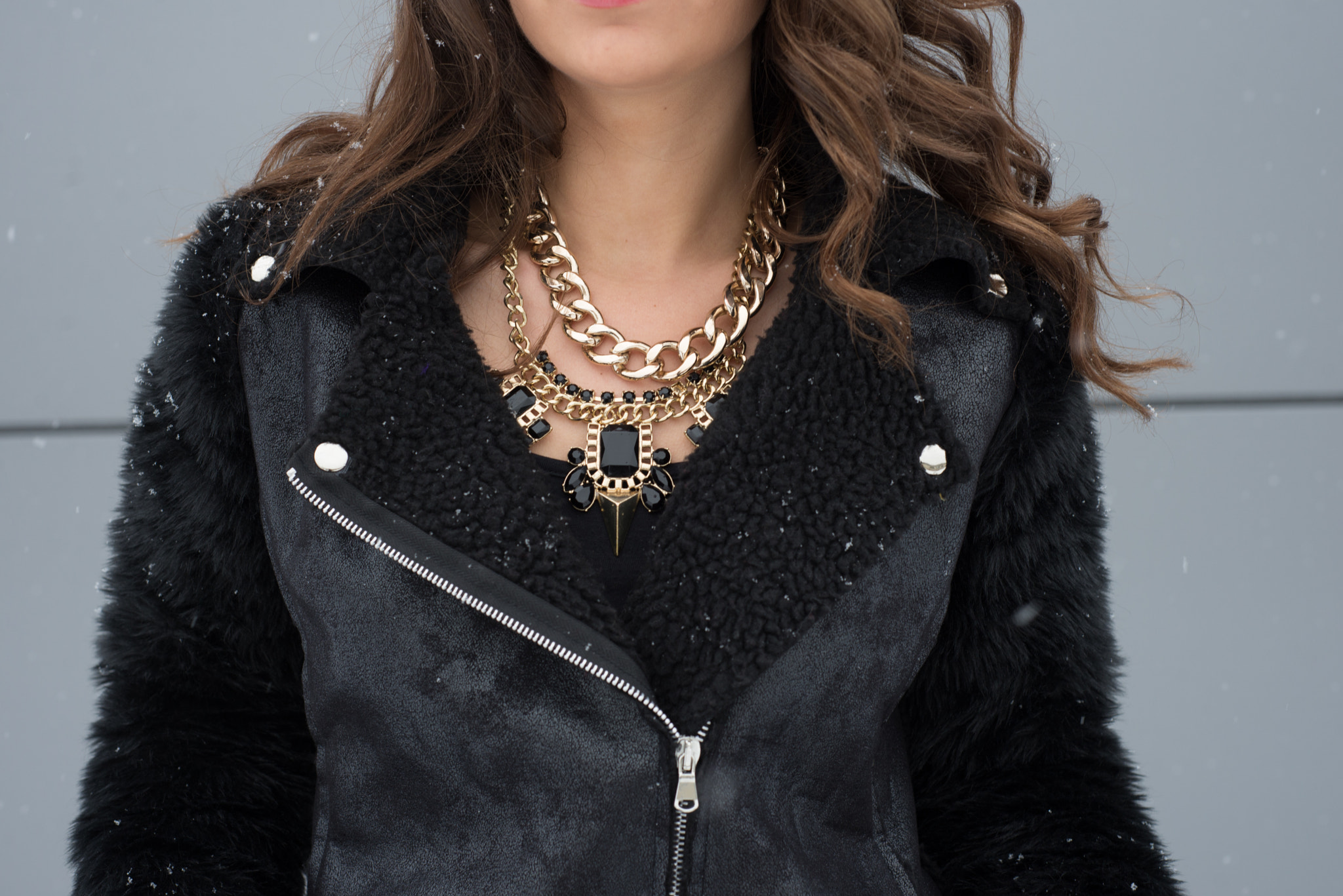 Woman outfit details posing in snow winter scene wearing a warm fur ...