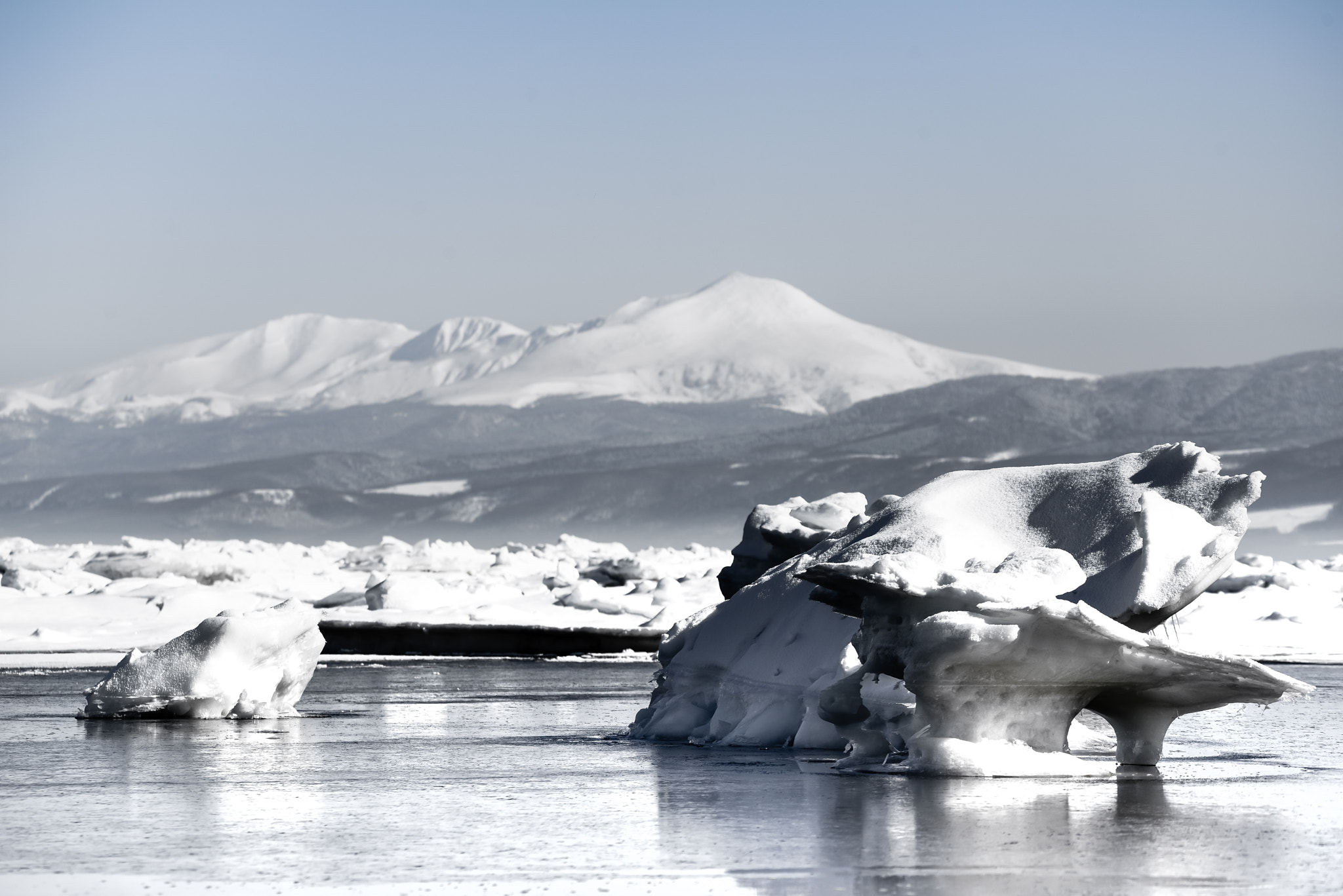 Mount Rausu and drift ice by Katsushi Matsuzaki / 500px